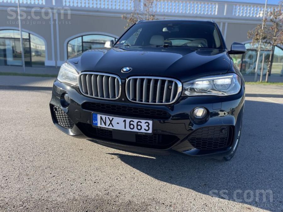 Black BMW X5 2014 in Riga, with an engine capacity of 3.00 L and mileage of 0 thousand km for 18590 €, photo 3 on AUTOMOTO.COM.LV