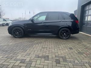 Black BMW X5 2014 in Ogre, with an engine capacity of 3.00 L and mileage of 250 thousand km for 21770 €, photo 2 on AUTOMOTO.COM.LV
