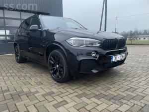 Black BMW X5 2014 in Ogre, with an engine capacity of 3.00 L and mileage of 250 thousand km for 21770 €, photo 6 on AUTOMOTO.COM.LV