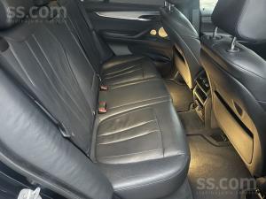 Black BMW X5 2014 in Ogre, with an engine capacity of 3.00 L and mileage of 250 thousand km for 21770 €, photo 8 on AUTOMOTO.COM.LV
