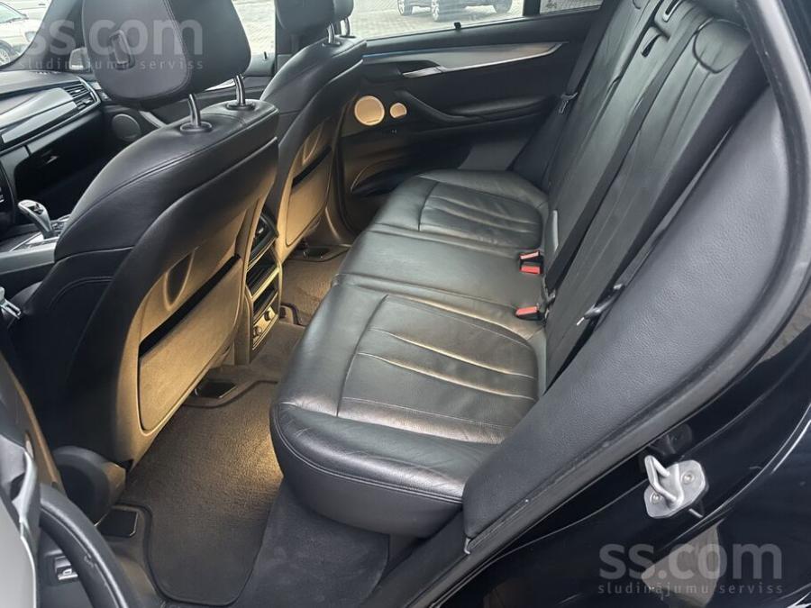 Black BMW X5 2014 in Ogre, with an engine capacity of 3.00 L and mileage of 250 thousand km for 21770 €, photo 9 on AUTOMOTO.COM.LV