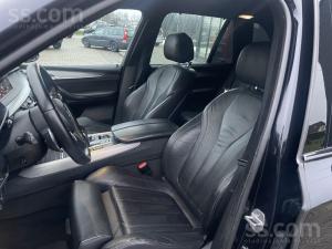 Black BMW X5 2014 in Ogre, with an engine capacity of 3.00 L and mileage of 250 thousand km for 21770 €, photo 11 on AUTOMOTO.COM.LV
