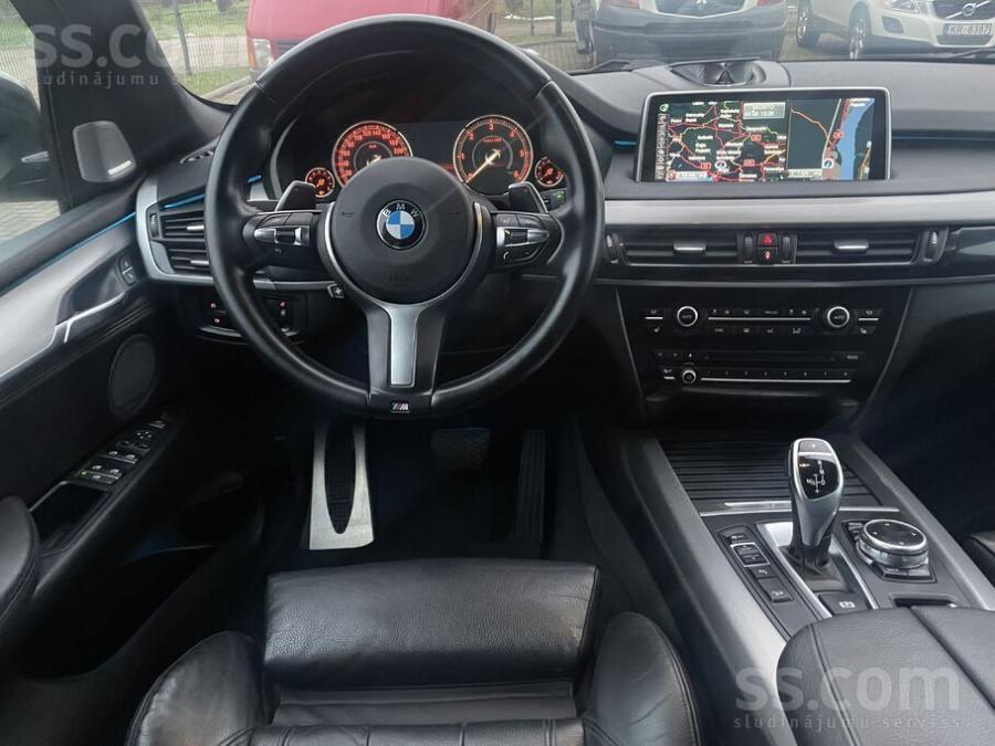 Black BMW X5 2014 in Ogre, with an engine capacity of 3.00 L and mileage of 250 thousand km for 21770 €, photo 12 on AUTOMOTO.COM.LV