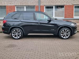Black BMW X5 2014 in Ogre, with an engine capacity of 2.00 L and mileage of 0 thousand km for 17550 €, photo 4 on AUTOMOTO.COM.LV