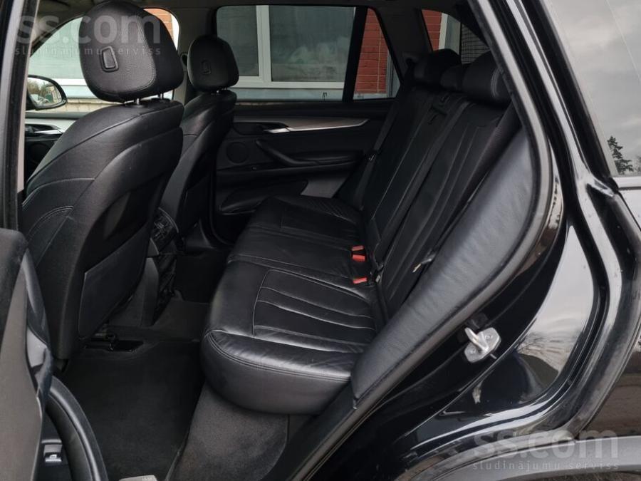 Black BMW X5 2014 in Ogre, with an engine capacity of 2.00 L and mileage of 0 thousand km for 17550 €, photo 12 on AUTOMOTO.COM.LV