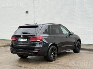 Black BMW X5 2014 in Riga, with an engine capacity of 3.00 L and mileage of 324 thousand km for 18500 €, photo 5 on AUTOMOTO.COM.LV