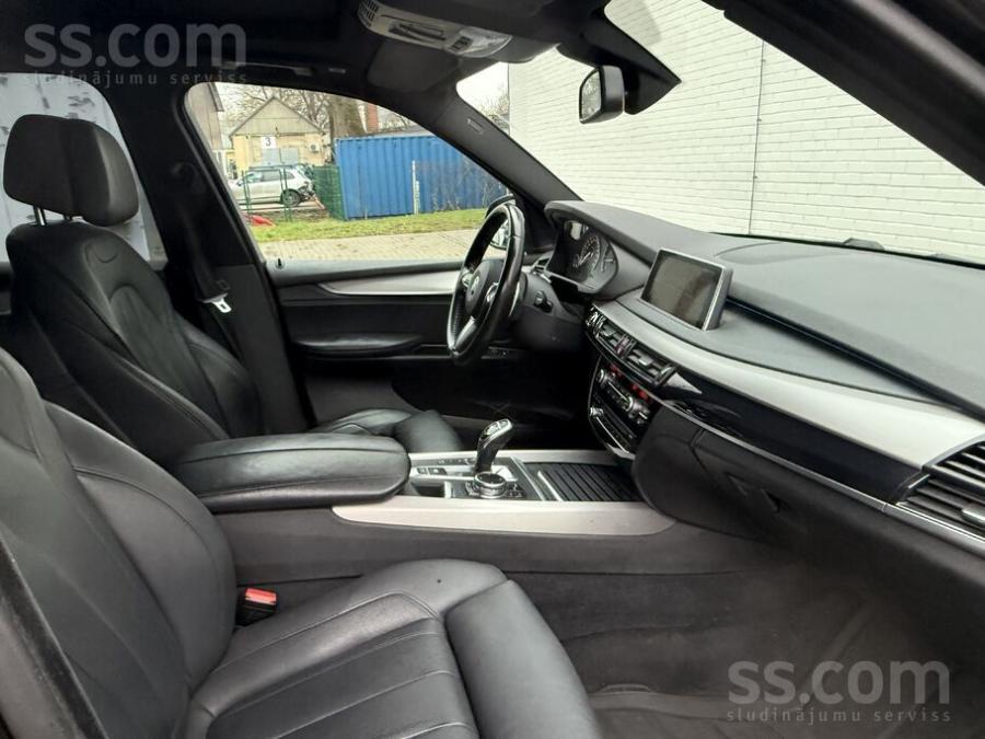 Black BMW X5 2014 in Riga, with an engine capacity of 3.00 L and mileage of 324 thousand km for 18500 €, photo 7 on AUTOMOTO.COM.LV