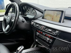 Black BMW X5 2014 in Riga, with an engine capacity of 3.00 L and mileage of 324 thousand km for 18500 €, photo 12 on AUTOMOTO.COM.LV