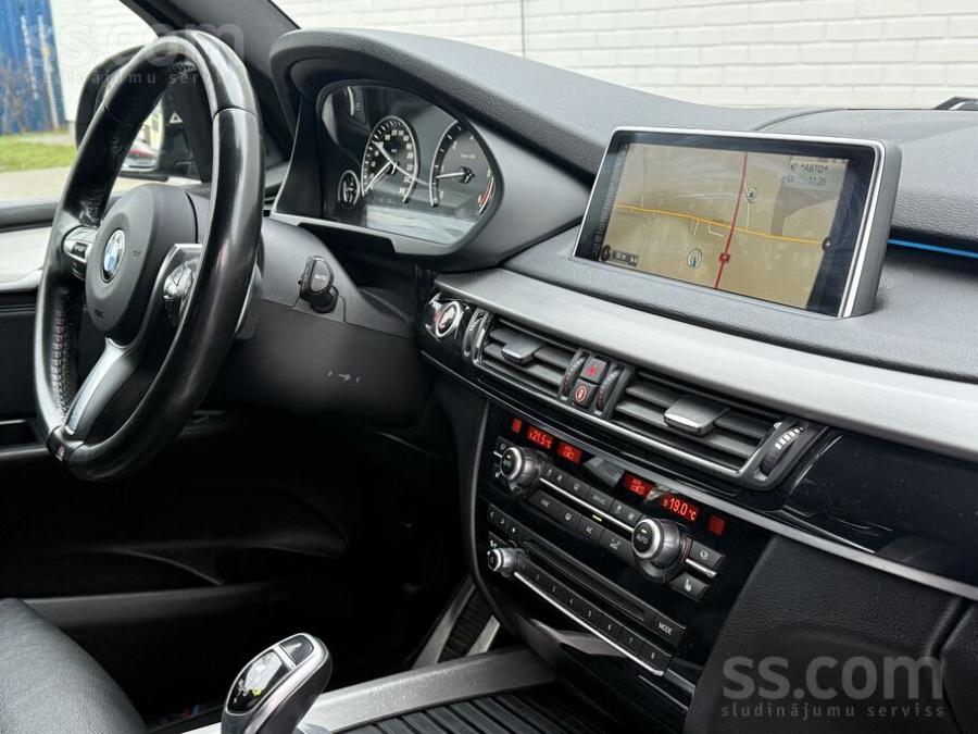 Black BMW X5 2014 in Riga, with an engine capacity of 3.00 L and mileage of 324 thousand km for 18500 €, photo 12 on AUTOMOTO.COM.LV