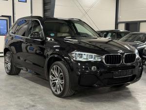 Black BMW X5 2014 in Marijampole, with an engine capacity of 2.99 L and mileage of 265 thousand km for 18999 €, photo  on AUTOMOTO.COM.LV