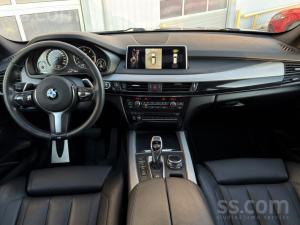 Black BMW X5 2014 in Riga, with an engine capacity of 3.00 L and mileage of 301 thousand km for 18900 €, photo 15 on AUTOMOTO.COM.LV