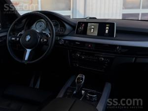 Black BMW X5 2014 in Riga, with an engine capacity of 3.00 L and mileage of 301 thousand km for 18900 €, photo 20 on AUTOMOTO.COM.LV