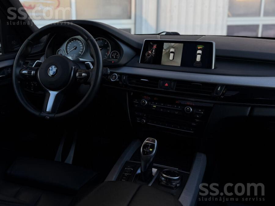 Black BMW X5 2014 in Riga, with an engine capacity of 3.00 L and mileage of 301 thousand km for 18900 €, photo 20 on AUTOMOTO.COM.LV