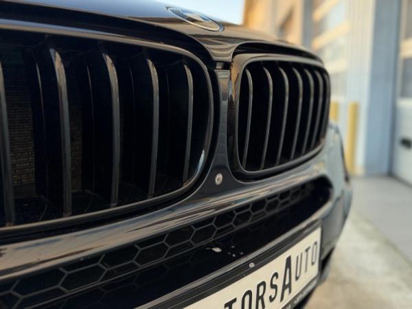 Black BMW X5 2014 in Riga, with an engine capacity of 3.00 L and mileage of 301 thousand km for 18900 €, photo 9 on AUTOMOTO.COM.LV