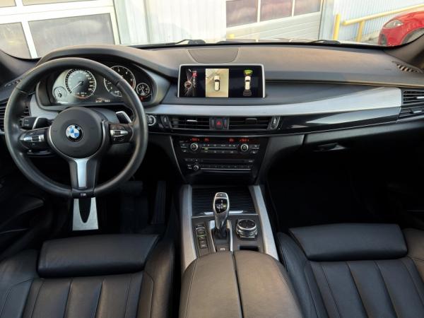 Black BMW X5 2014 in Riga, with an engine capacity of 3.00 L and mileage of 301 thousand km for 18900 €, photo 5 on AUTOMOTO.COM.LV
