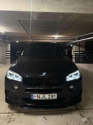 Black BMW X5 2014 in Vilnius, with an engine capacity of 2.99 L and mileage of 300 thousand km for 21500 €, photo  on AUTOMOTO.COM.LV