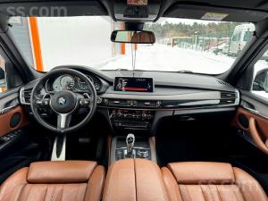 Black BMW X5 2014 in Riga, with an engine capacity of 3.00 L and mileage of 262 thousand km for 22500 €, photo 13 on AUTOMOTO.COM.LV