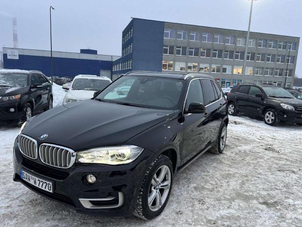 Black BMW X5 2014 in Kaunas, with an engine capacity of 2.99 L and mileage of 261 thousand km for 18750 €, photo 1 on AUTOMOTO.COM.LV