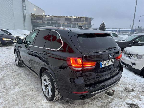 Black BMW X5 2014 in Kaunas, with an engine capacity of 2.99 L and mileage of 261 thousand km for 18750 €, photo 3 on AUTOMOTO.COM.LV