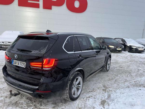 Black BMW X5 2014 in Kaunas, with an engine capacity of 2.99 L and mileage of 261 thousand km for 18750 €, photo 4 on AUTOMOTO.COM.LV