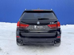 Black BMW X5 2014 in Kaunas, with an engine capacity of 3.00 L and mileage of 142 thousand km for 23800 €, photo 4 on AUTOMOTO.COM.LV