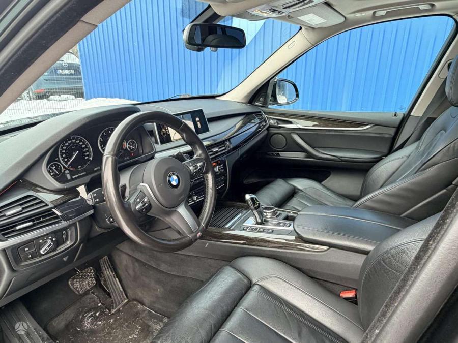 Black BMW X5 2014 in Kaunas, with an engine capacity of 3.00 L and mileage of 142 thousand km for 23800 €, photo 11 on AUTOMOTO.COM.LV