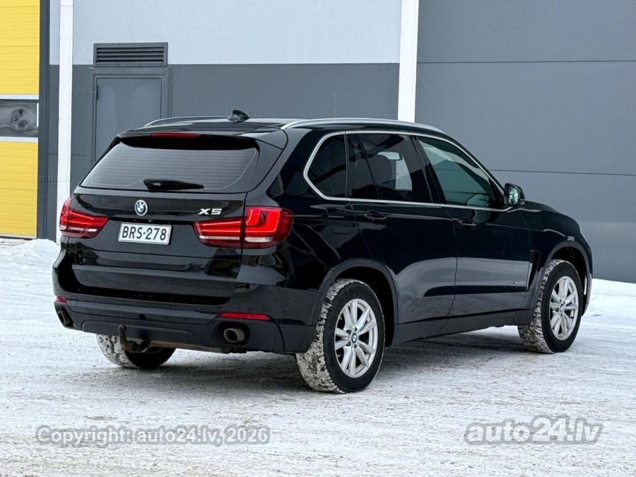 Black BMW X5 2014 in Tallinn, with an engine capacity of 2.00 L and mileage of 246 thousand km for 17500 €, photo 4 on AUTOMOTO.COM.LV
