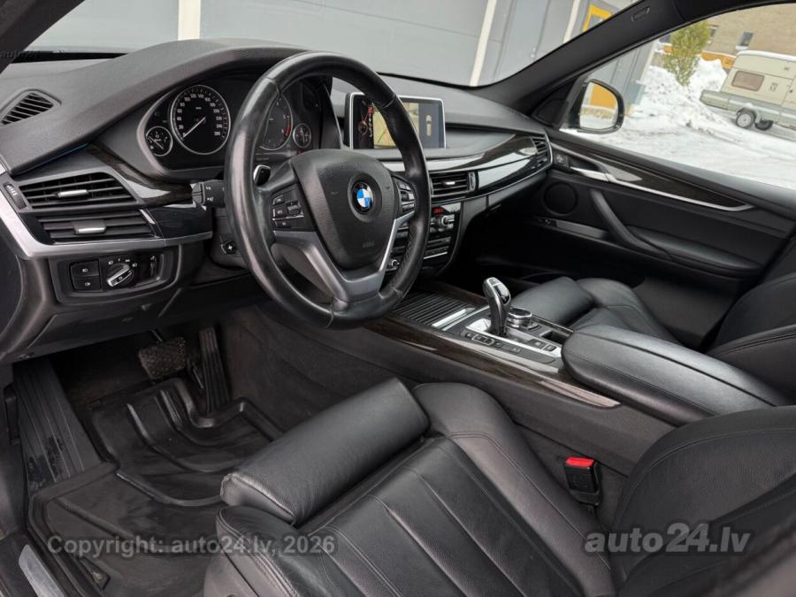 Black BMW X5 2014 in Tallinn, with an engine capacity of 2.00 L and mileage of 246 thousand km for 17500 €, photo 6 on AUTOMOTO.COM.LV