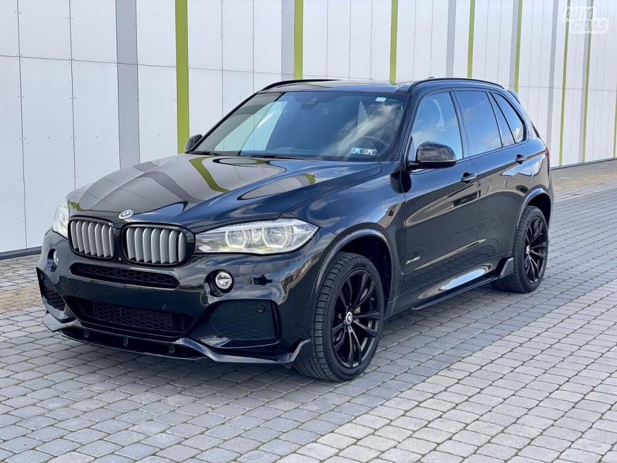 Black BMW X5 2014 in Raseiniai, with an engine capacity of 4.40 L and mileage of 196 thousand km for 19500 €, photo 1 on AUTOMOTO.COM.LV