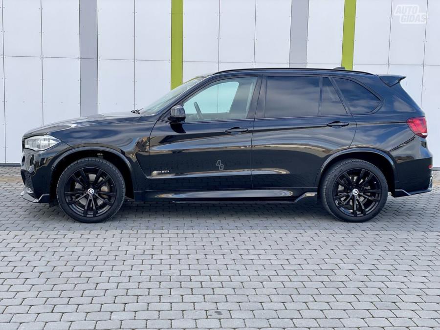 Black BMW X5 2014 in Raseiniai, with an engine capacity of 4.40 L and mileage of 196 thousand km for 19500 €, photo 4 on AUTOMOTO.COM.LV