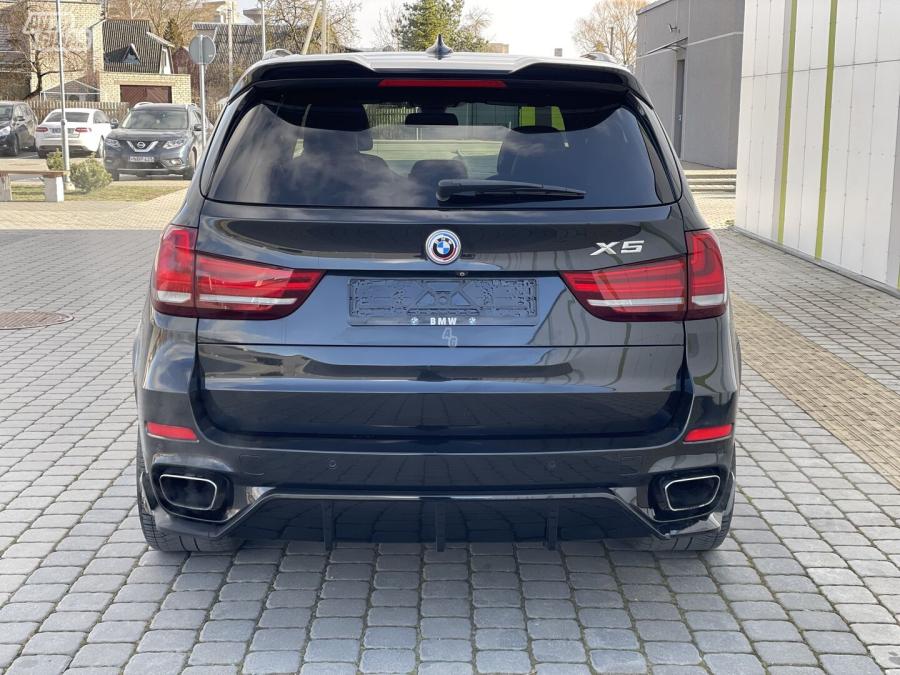 Black BMW X5 2014 in Raseiniai, with an engine capacity of 4.40 L and mileage of 196 thousand km for 19500 €, photo 6 on AUTOMOTO.COM.LV