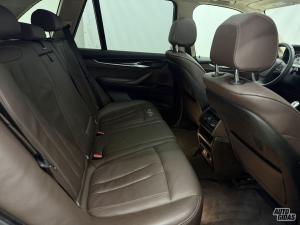 Black BMW X5 2014 in Avizieniai, with an engine capacity of 3.00 L and mileage of 213 thousand km for 17000 €, photo 12 on AUTOMOTO.COM.LV