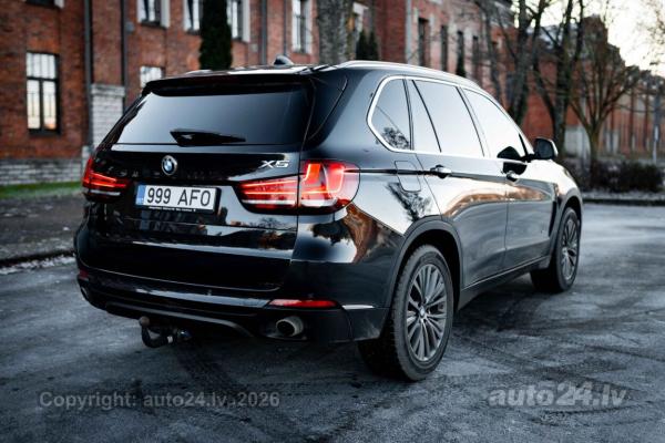 Black BMW X5 2014 in Tallinn, with an engine capacity of 2.00 L and mileage of 224 thousand km for 14999 €, photo 4 on AUTOMOTO.COM.LV