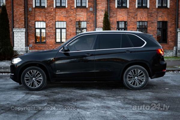 Black BMW X5 2014 in Tallinn, with an engine capacity of 2.00 L and mileage of 224 thousand km for 14999 €, photo 6 on AUTOMOTO.COM.LV