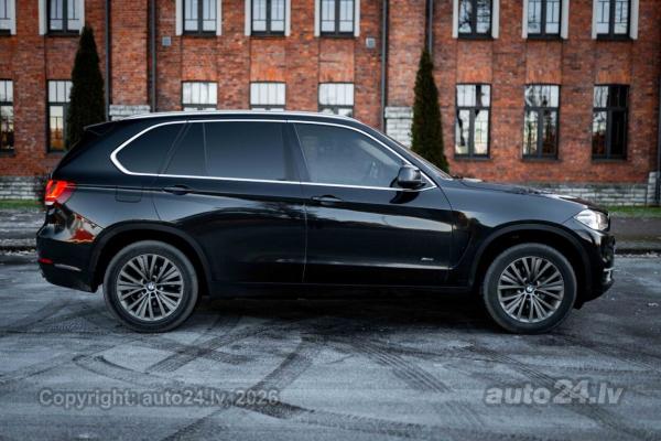 Black BMW X5 2014 in Tallinn, with an engine capacity of 2.00 L and mileage of 224 thousand km for 14999 €, photo 7 on AUTOMOTO.COM.LV