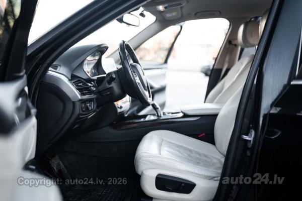 Black BMW X5 2014 in Tallinn, with an engine capacity of 2.00 L and mileage of 224 thousand km for 14999 €, photo 8 on AUTOMOTO.COM.LV