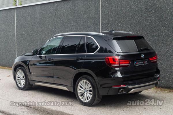 Black BMW X5 2014 in Parnu, with an engine capacity of 3.00 L and mileage of 228 thousand km for 20490 €, photo 4 on AUTOMOTO.COM.LV