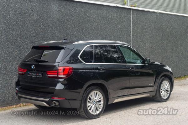 Black BMW X5 2014 in Parnu, with an engine capacity of 3.00 L and mileage of 228 thousand km for 20490 €, photo 5 on AUTOMOTO.COM.LV