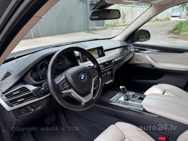 Black BMW X5 2014 in Parnu, with an engine capacity of 3.00 L and mileage of 228 thousand km for 20490 €, photo 6 on AUTOMOTO.COM.LV