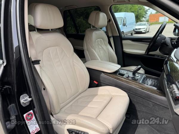 Black BMW X5 2014 in Parnu, with an engine capacity of 3.00 L and mileage of 228 thousand km for 20490 €, photo 8 on AUTOMOTO.COM.LV