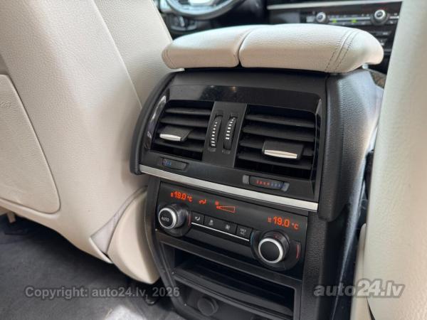 Black BMW X5 2014 in Parnu, with an engine capacity of 3.00 L and mileage of 228 thousand km for 20490 €, photo 11 on AUTOMOTO.COM.LV