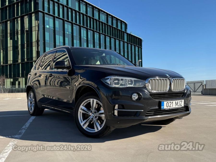 Black BMW X5 2014 in Tallinn, with an engine capacity of 3.00 L and mileage of 268 thousand km for 20700 €, photo 1 on AUTOMOTO.COM.LV