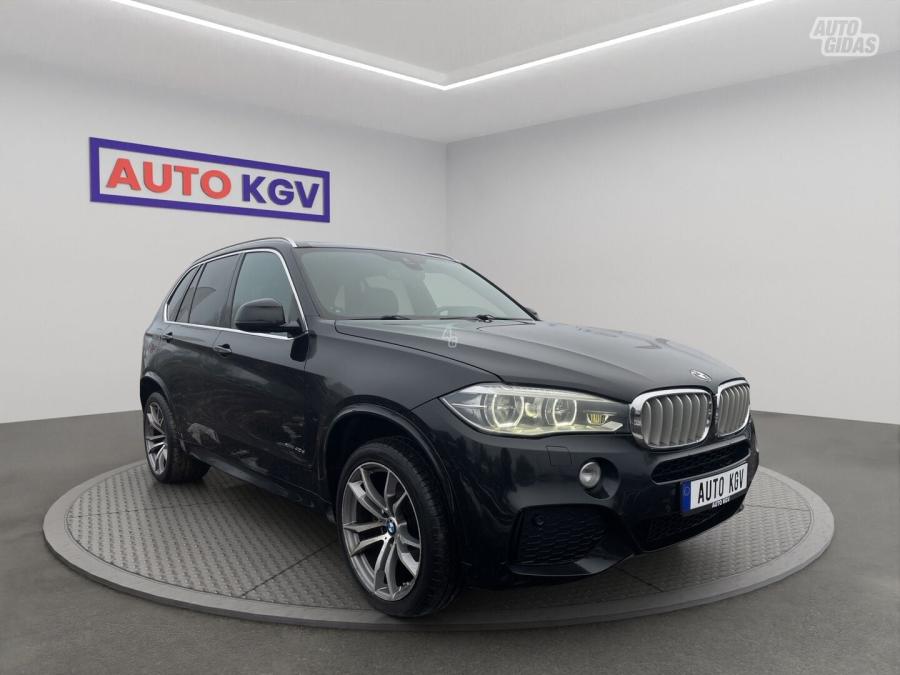 Black BMW X5 2014 in Vilnius, with an engine capacity of 3.00 L and mileage of 281 thousand km for 18999 €, photo 7 on AUTOMOTO.COM.LV