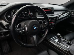 Black BMW X5 2014 in Vilnius, with an engine capacity of 3.00 L and mileage of 281 thousand km for 18999 €, photo 15 on AUTOMOTO.COM.LV
