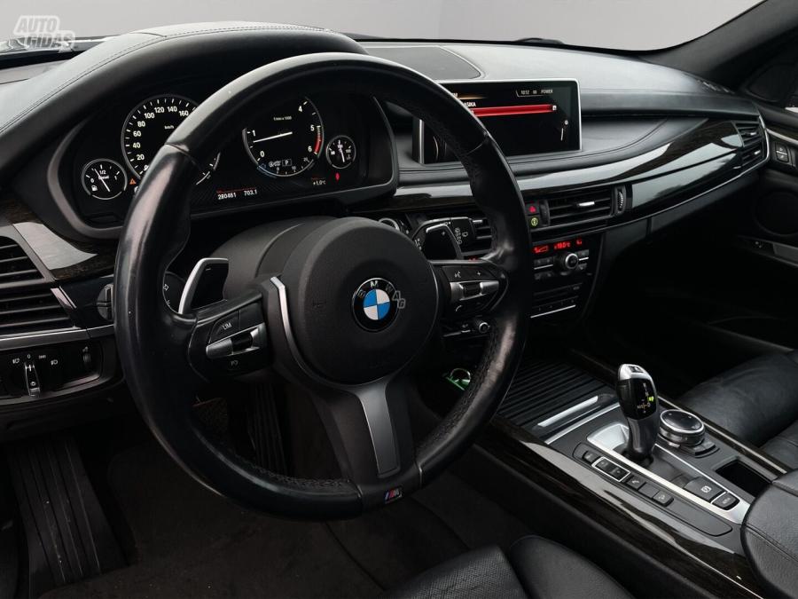 Black BMW X5 2014 in Vilnius, with an engine capacity of 3.00 L and mileage of 281 thousand km for 18999 €, photo 15 on AUTOMOTO.COM.LV