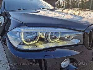 Black BMW X5 2014 in Tartu, with an engine capacity of 3.00 L and mileage of 228 thousand km for 23490 €, photo 6 on AUTOMOTO.COM.LV