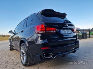 Black BMW X5 2014 in Tartu, with an engine capacity of 3.00 L and mileage of 228 thousand km for 23490 €, photo 8 on AUTOMOTO.COM.LV