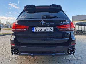 Black BMW X5 2014 in Tartu, with an engine capacity of 3.00 L and mileage of 228 thousand km for 23490 €, photo 9 on AUTOMOTO.COM.LV