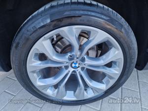 Black BMW X5 2014 in Tartu, with an engine capacity of 3.00 L and mileage of 228 thousand km for 23490 €, photo 12 on AUTOMOTO.COM.LV