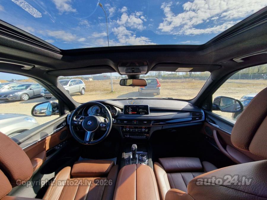 Black BMW X5 2014 in Tartu, with an engine capacity of 3.00 L and mileage of 228 thousand km for 23490 €, photo 15 on AUTOMOTO.COM.LV